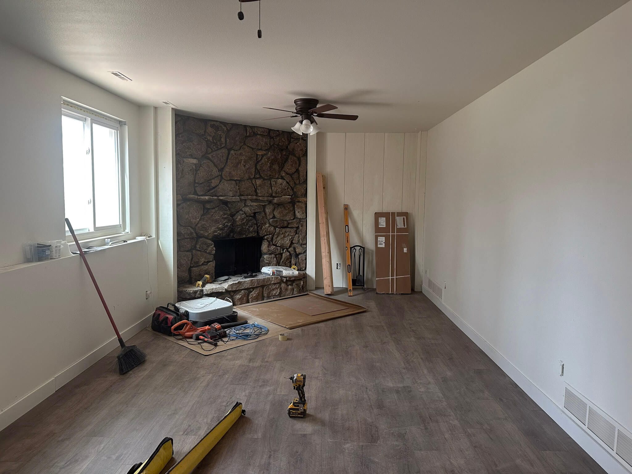 How To Paint A Stone Fireplace: DIY Tutorial